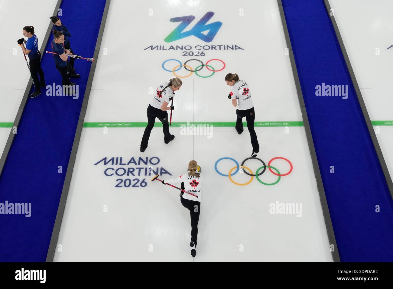 Canada's Sarah Wilkes, Emma Miskew and Tracy Fleury compete during a ...