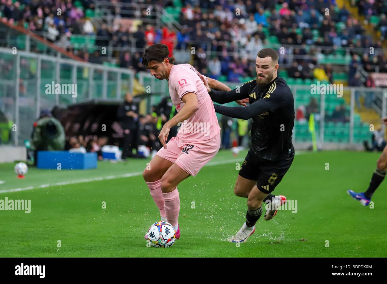 Pietro Ceccaroni (Palermo F.C.) in action against Nermin Karic (Virtus ...