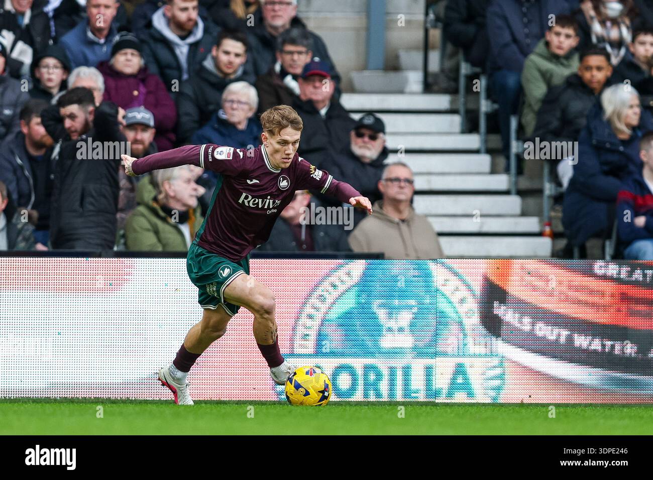 30, Ethan Galbraith of Swansea City in action with the ball during the ...