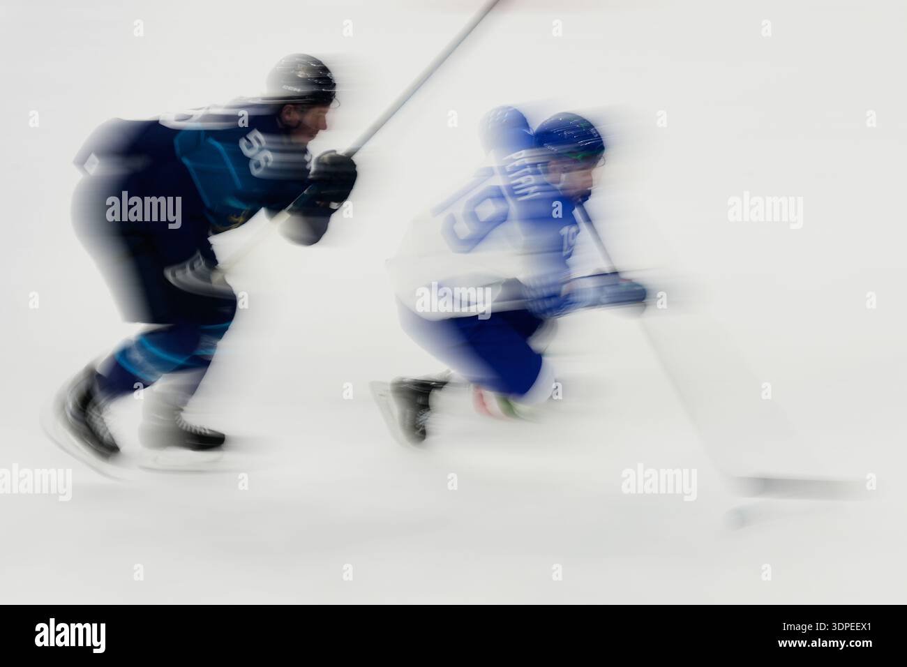 Finland's Erik Haula, left, challenges Italy's Alex Petan during a ...