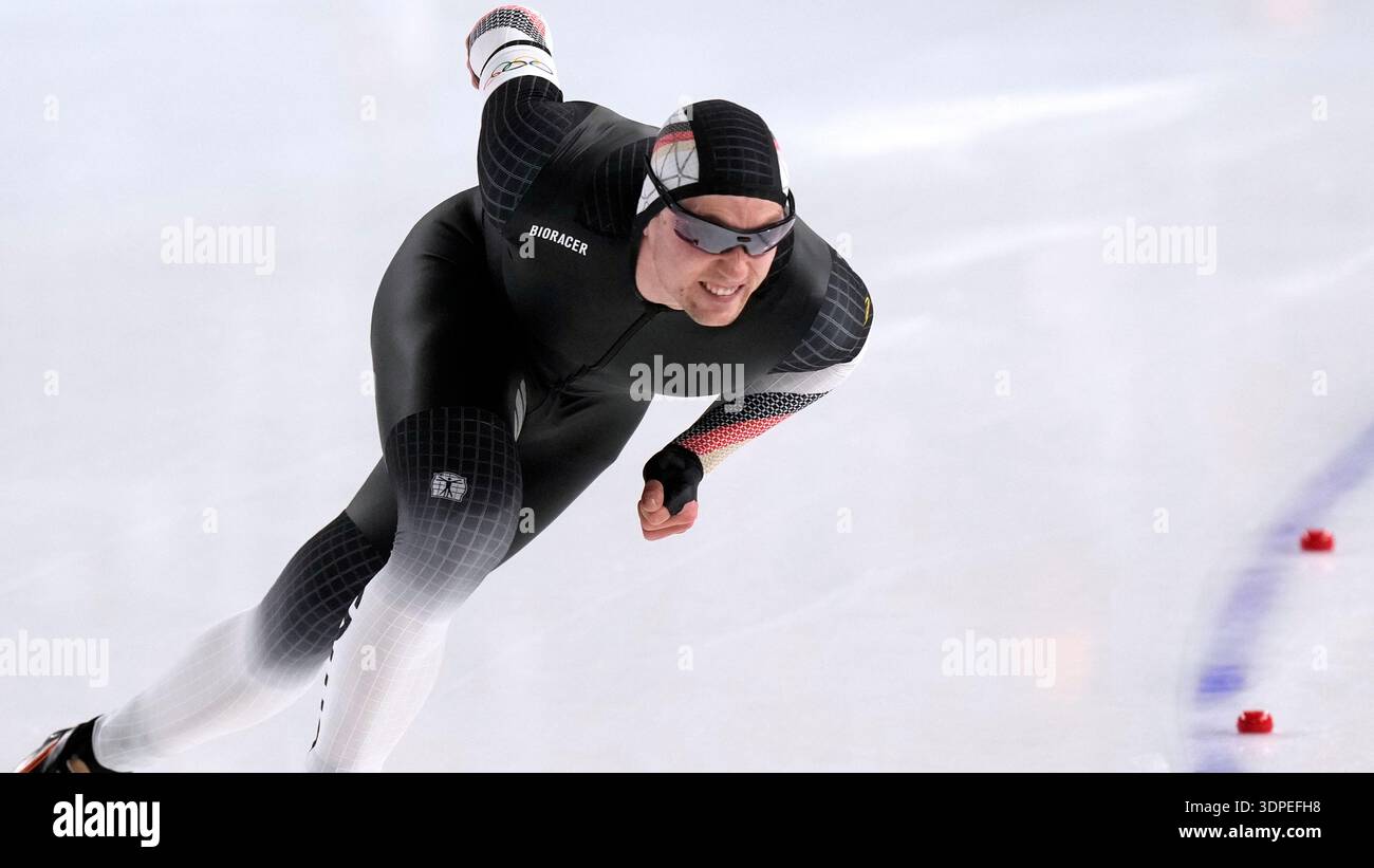 Hendrik Dombek of Germany competes in the men's 500 meters speedskating ...