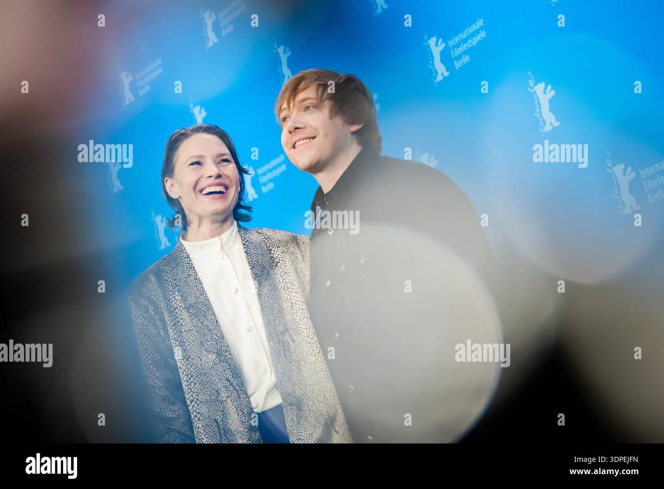 14 February 2026, Berlin: Seidi Haarla, actress, and Rupert Grint ...