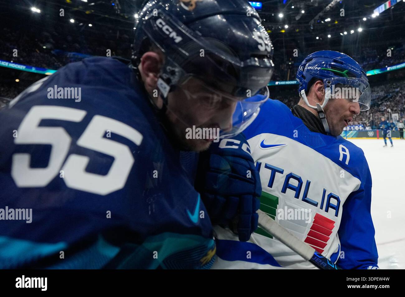 Italy's Alex Trivellato, right, checks Finland's Rasmus Ristolainen ...