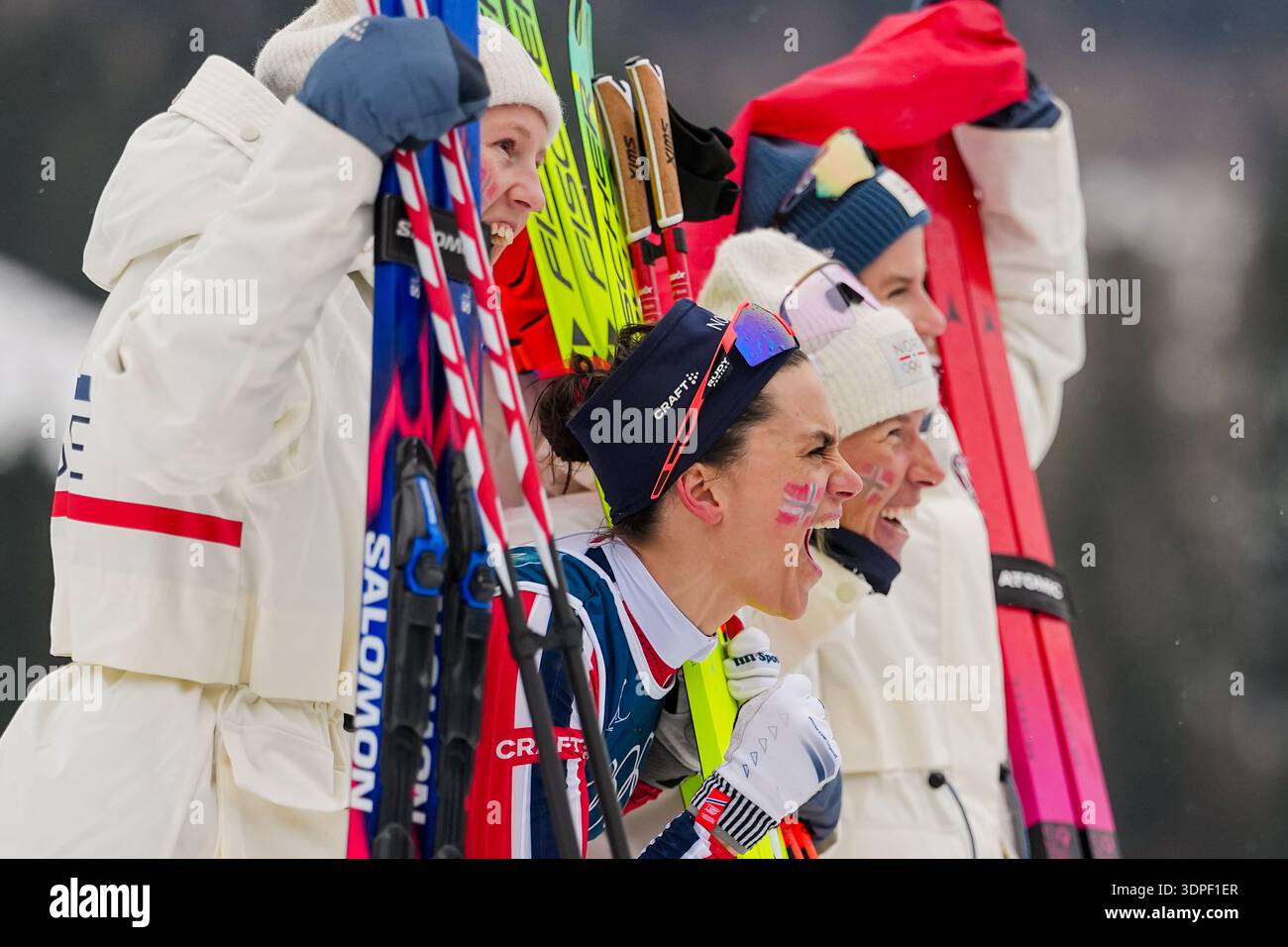 Heidi Weng, of Norway, center, and her teammates celebrate after ...