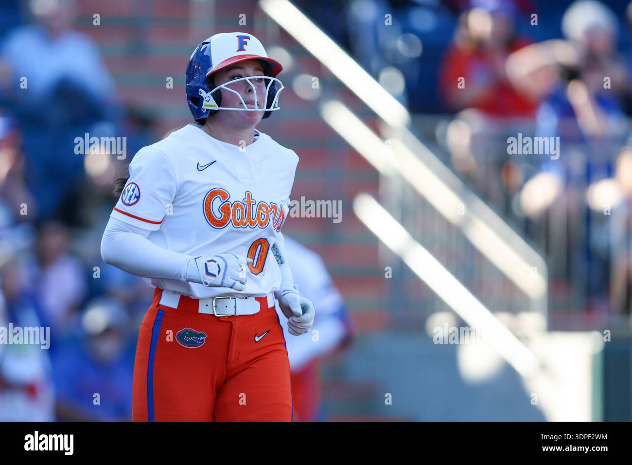 Florida pitcher Ava Brown (00) runs to first during an NCAA softball ...