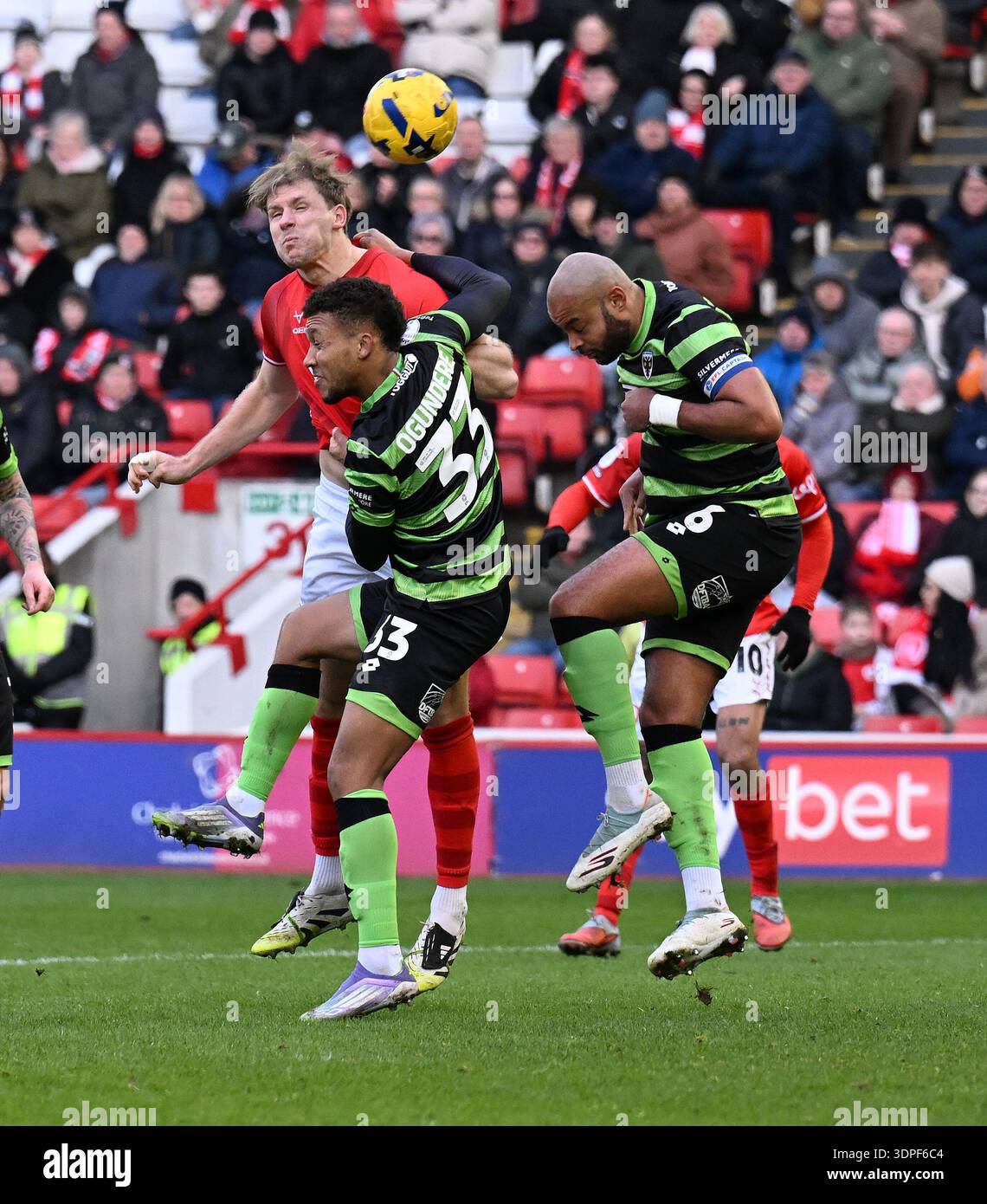 Barnsley's Marc Roberts heads the ball towards goal in the match ...