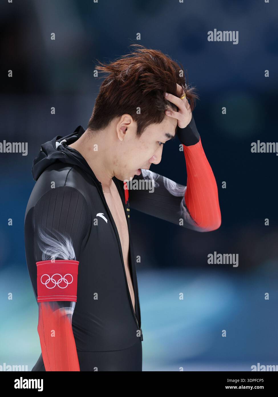 Milan, Italy. 14th Feb, 2026. Gao Tingyu of China reacts after the ...
