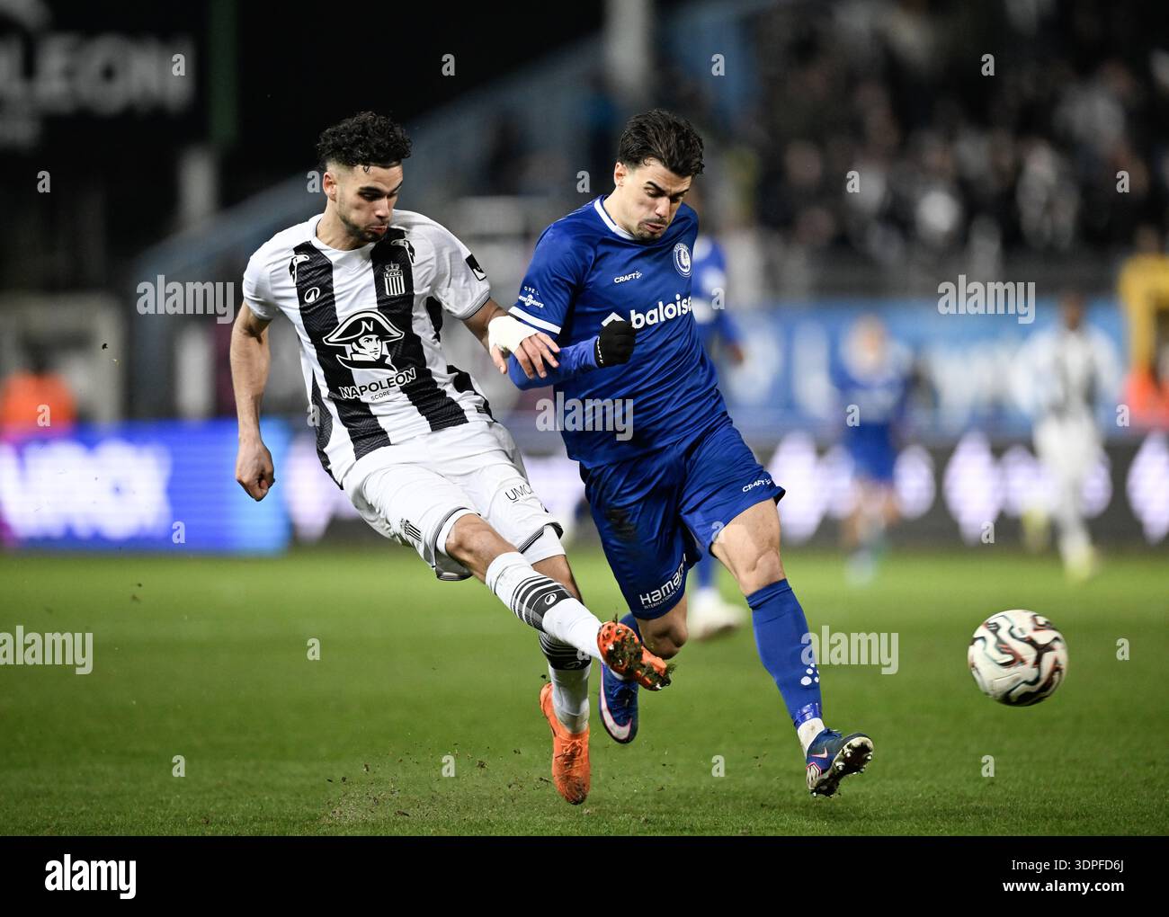 Charleroi, Belgium. 14th Feb, 2026. Charleroi's Aiham Ousou and Gent's ...
