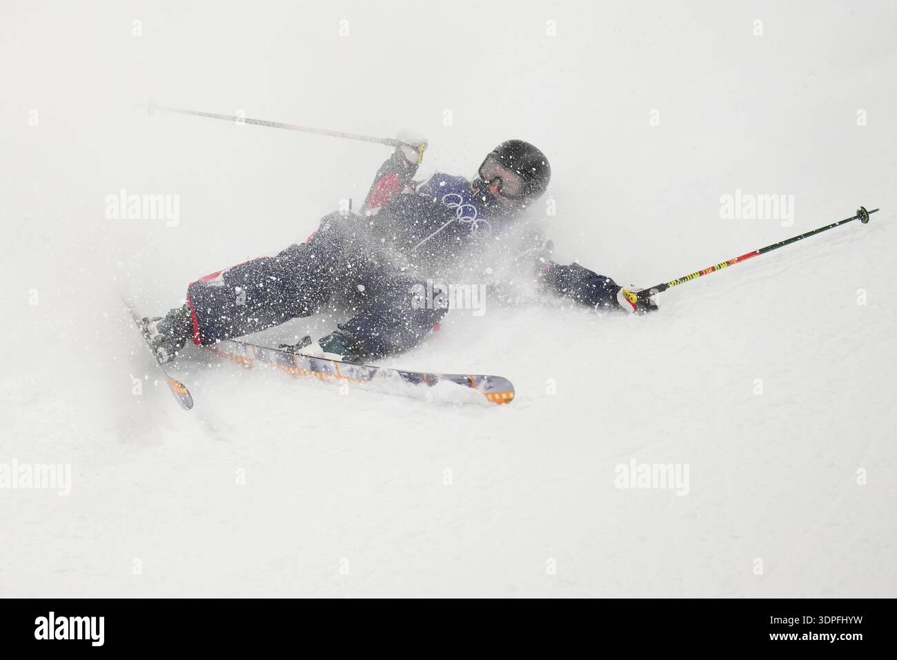 France's Kim Dumont Zanella crashes as she competes in the women's ...