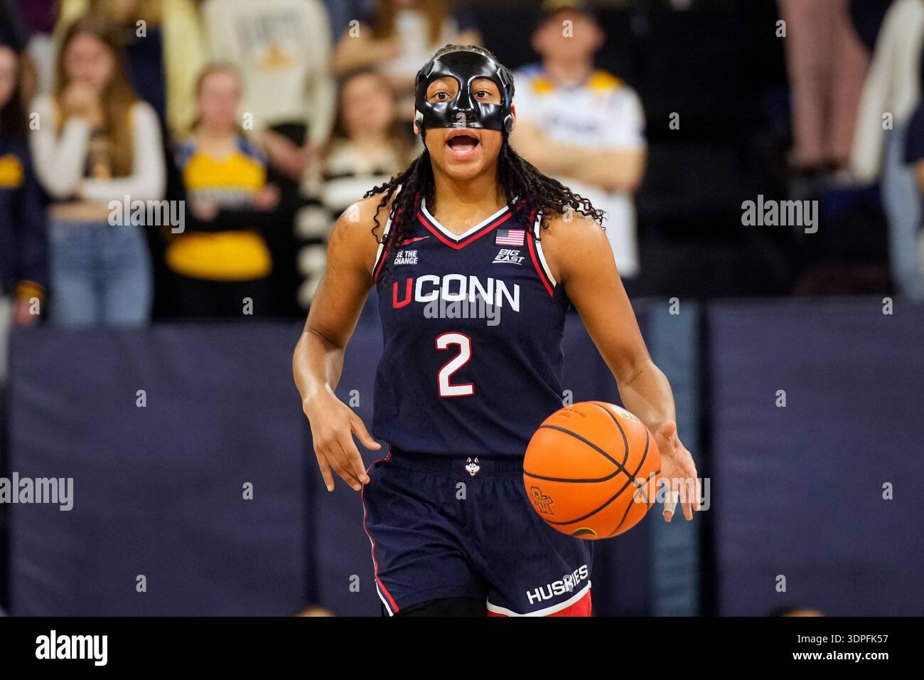 UConn guard KK Arnold dribbles during the first half of an NCAA college ...