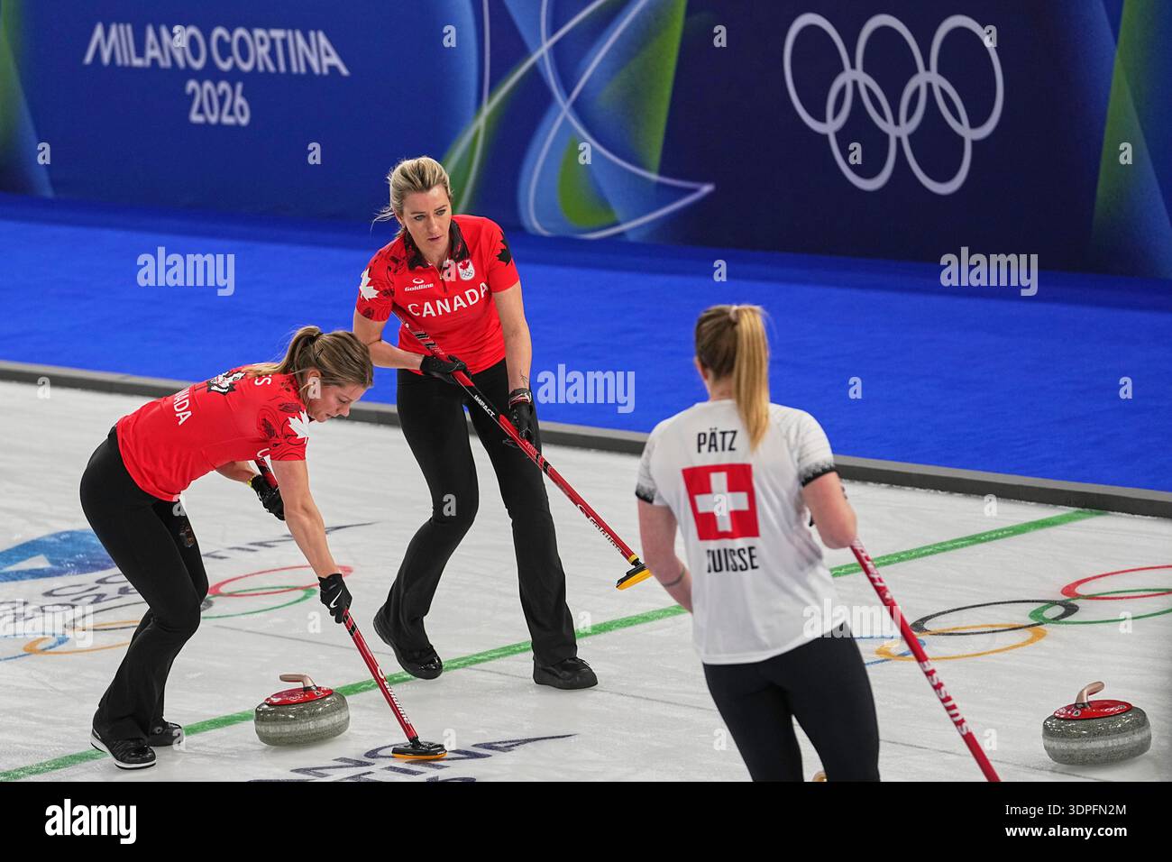 Canada's Emma Miskew and Sarah Wilkes compete against Switzerland's ...