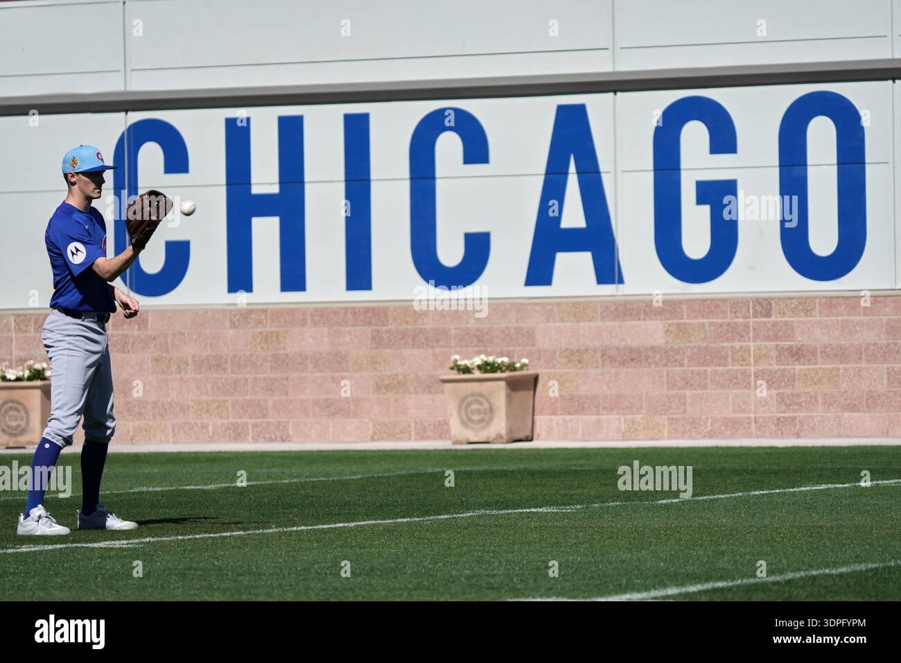 Chicago Cub's Hoby Milner throws during a spring training baseball ...