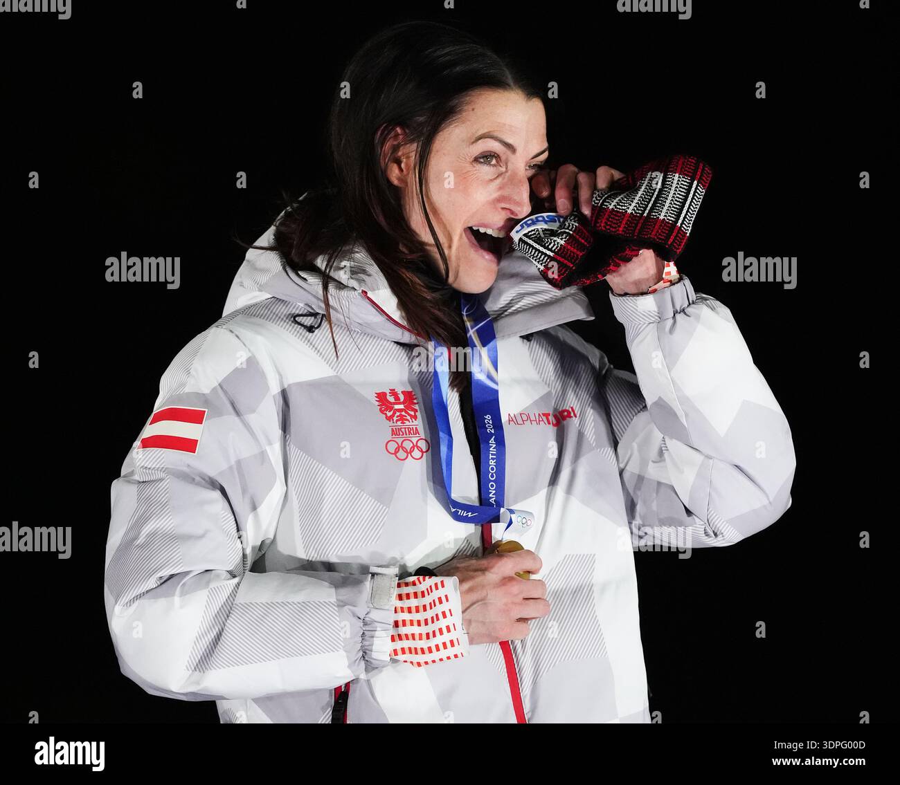 Austria's Janine Flock celebrates with her gold medal following heat 4 ...