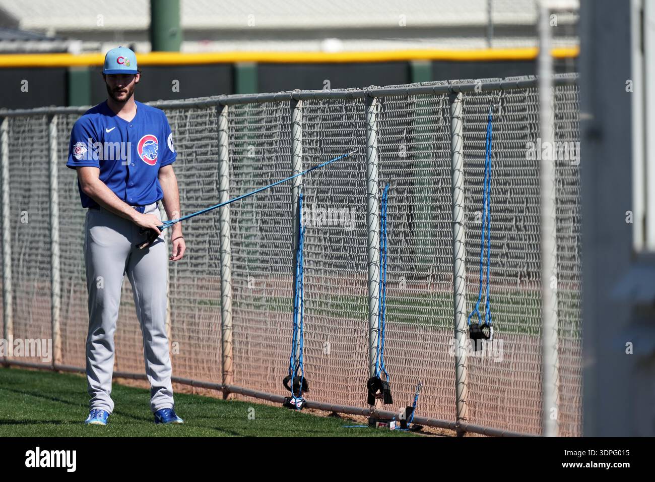 Chicago Cub's Jack Neely stretches during a spring training baseball ...