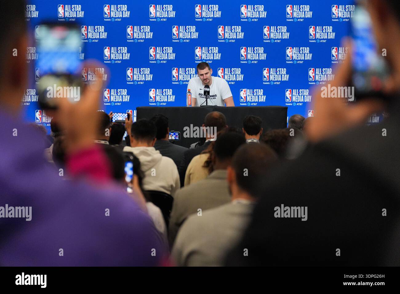 Denver Nuggets' Nikola Jokic talks to reporters during the NBA All-Star ...