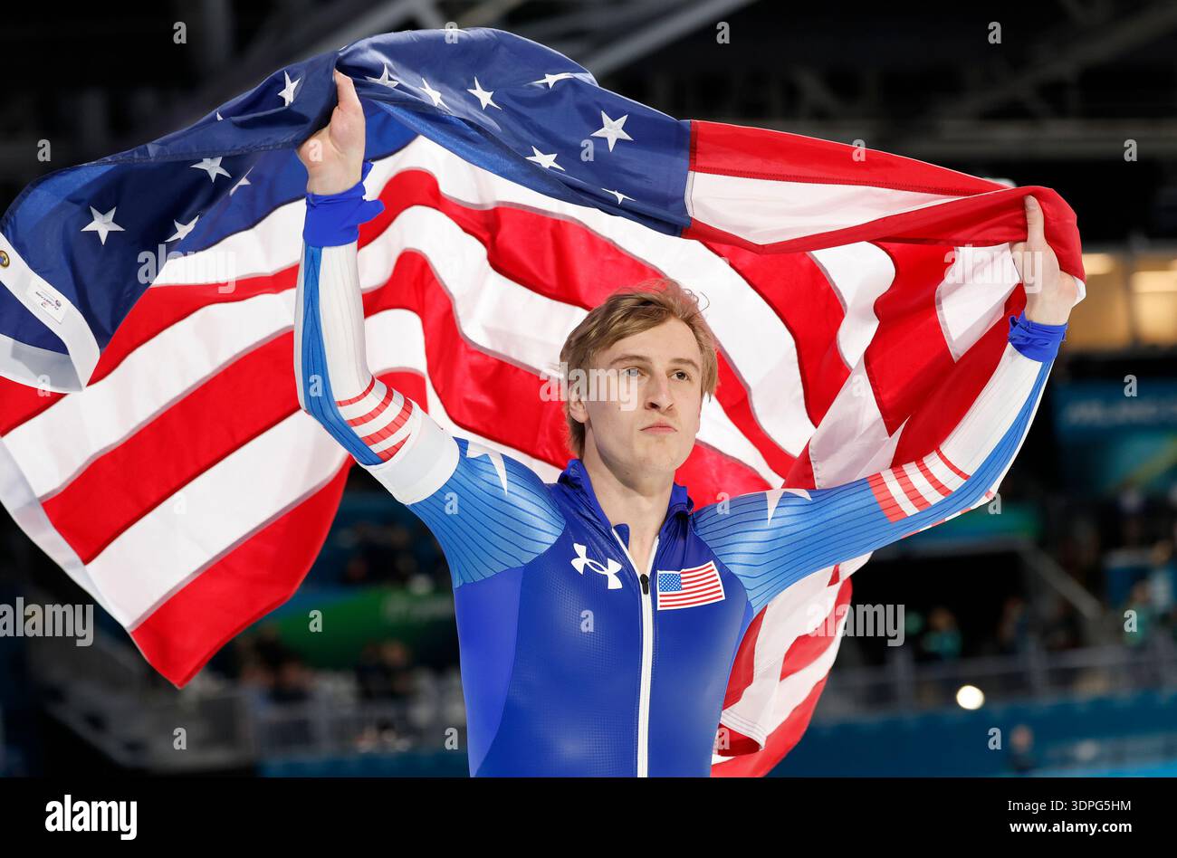The United States Jordan Stolz skates with the American flag after ...