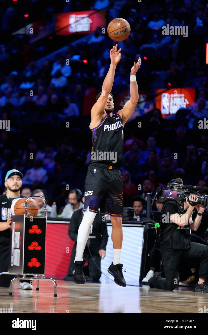 Phoenix Suns guard Devin Booker shoots during the 3-point contest at ...