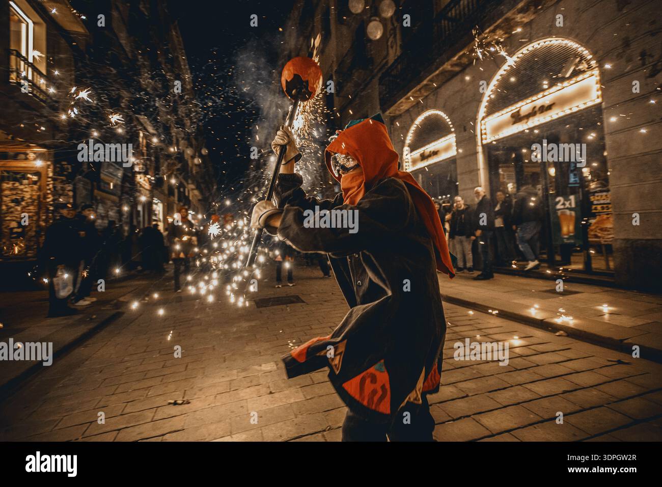Barcelona, Spain. 14 February, 2026: Little fire runners in devil ...