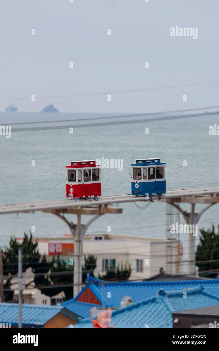 Haeundae Blue Line Park, Busan, ride on multicoloured sky capsule train ...