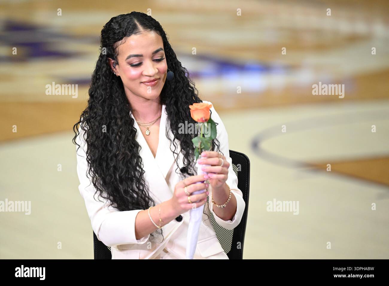 ESPN College Gameday's Andraya Carter holding a rose for Valentine's ...