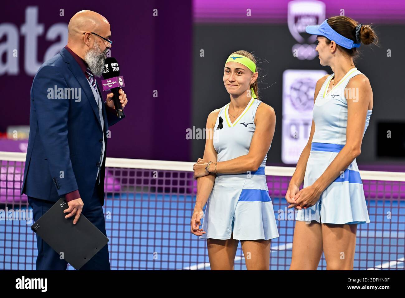 Anna Danilina (R) of Kazakhstan and Aleksandra Krunic (C) of Serbia ...