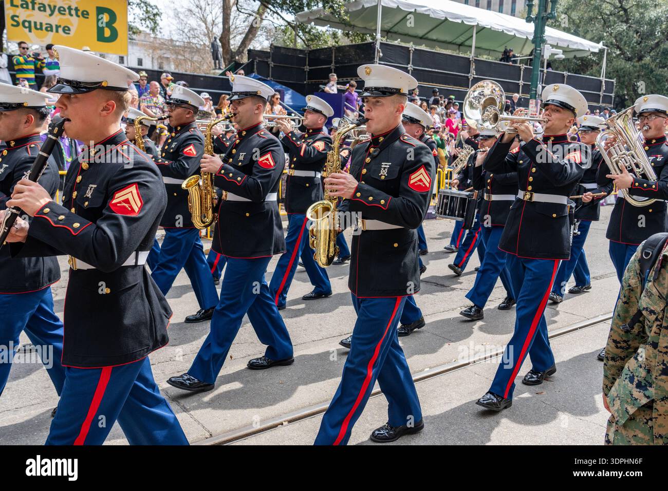Attendees march during the annual Krewe of Iris parade during the Mardi ...