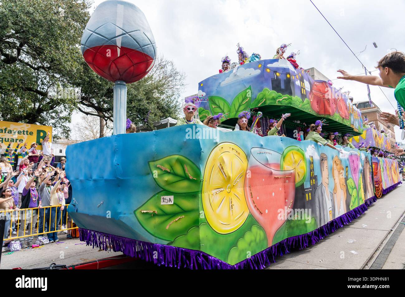 Attendees march during the annual Krewe of Iris parade during the Mardi ...