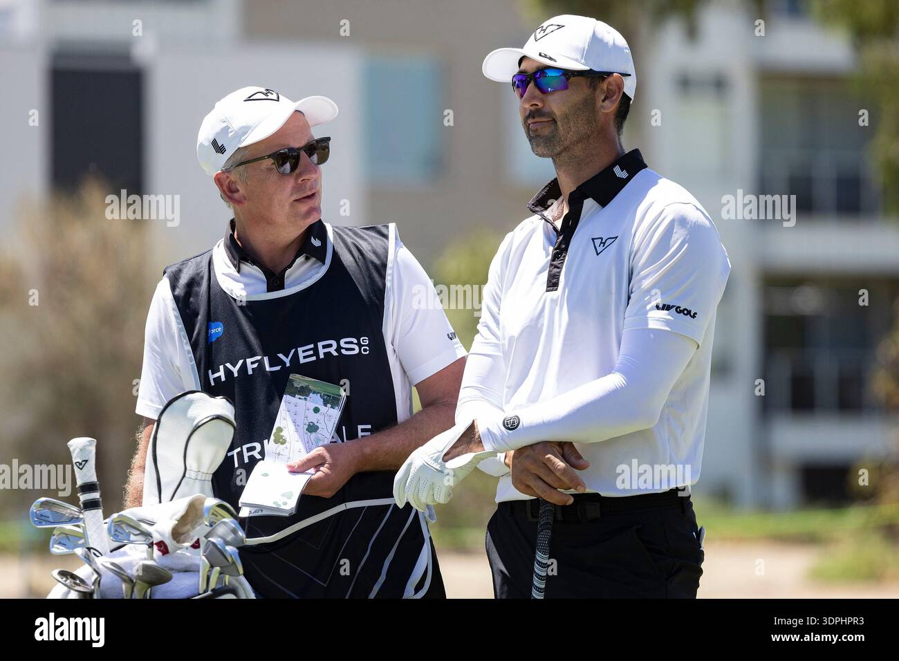 Cameron Tringale of HyFlyers GC and his caddie look on during the final ...