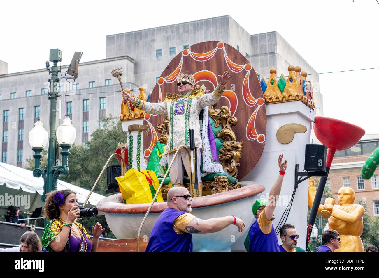 Attendees march during the annual Krewe of Tucks parade during the ...