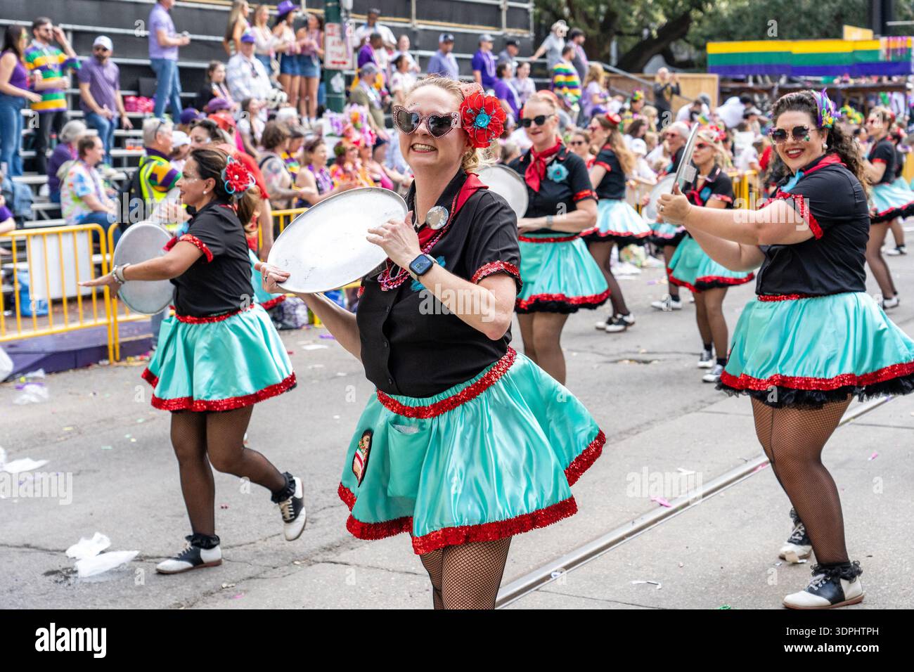 Attendees march during the annual Krewe of Tucks parade during the ...