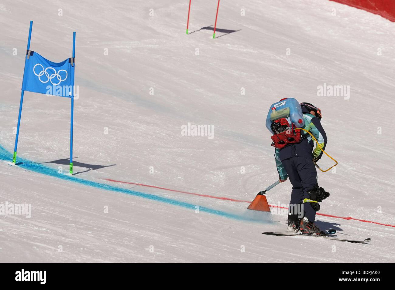 The lines marking the course are prepared ahead of an alpine ski, women ...