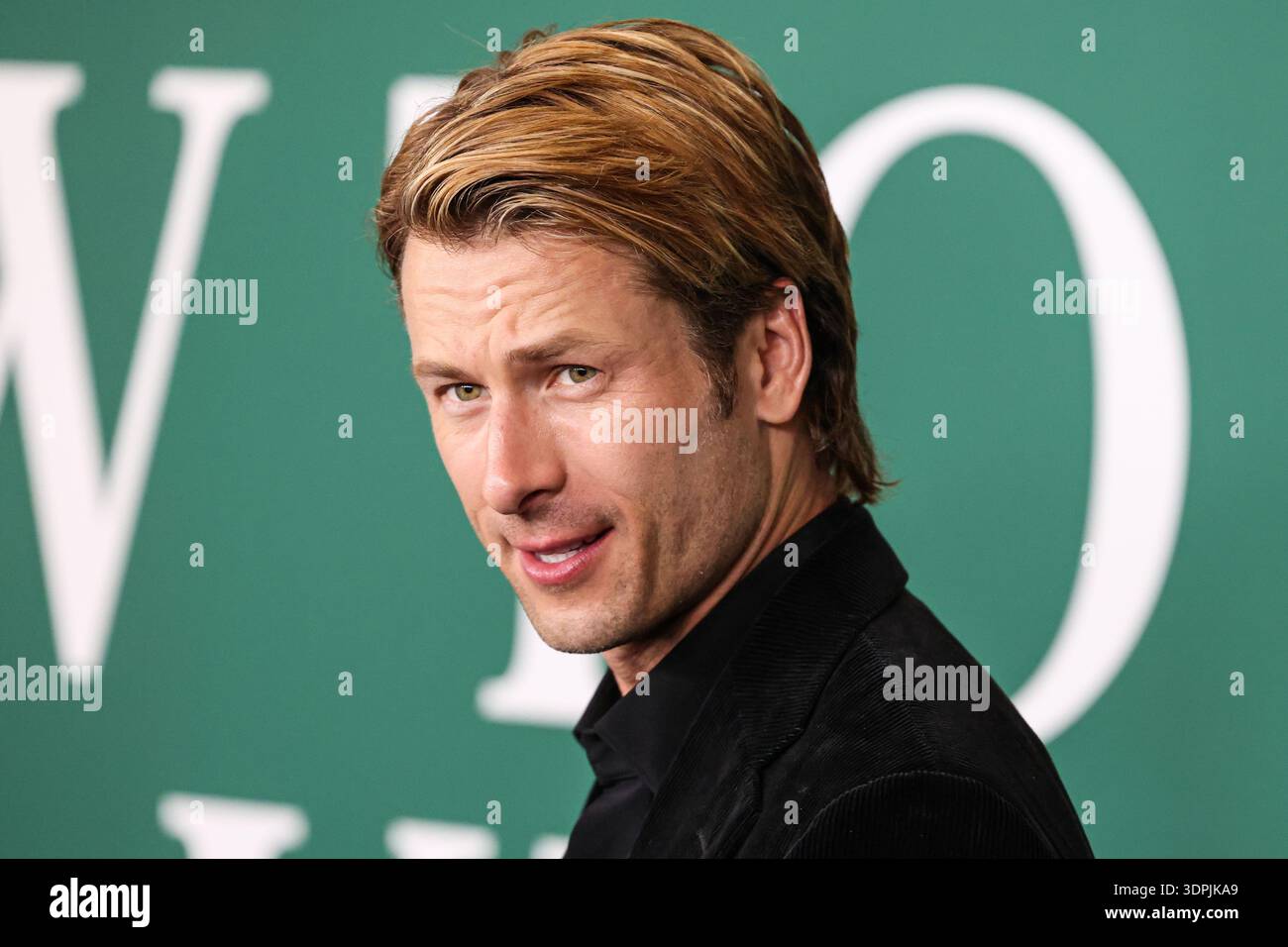 BEVERLY GROVE, LOS ANGELES, CALIFORNIA, USA - FEBRUARY 14: Glen Powell ...
