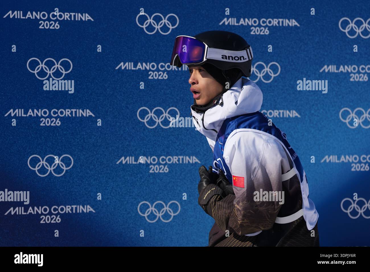 China's Ge Chunyu reacts during the men's snowboarding slopestyle ...