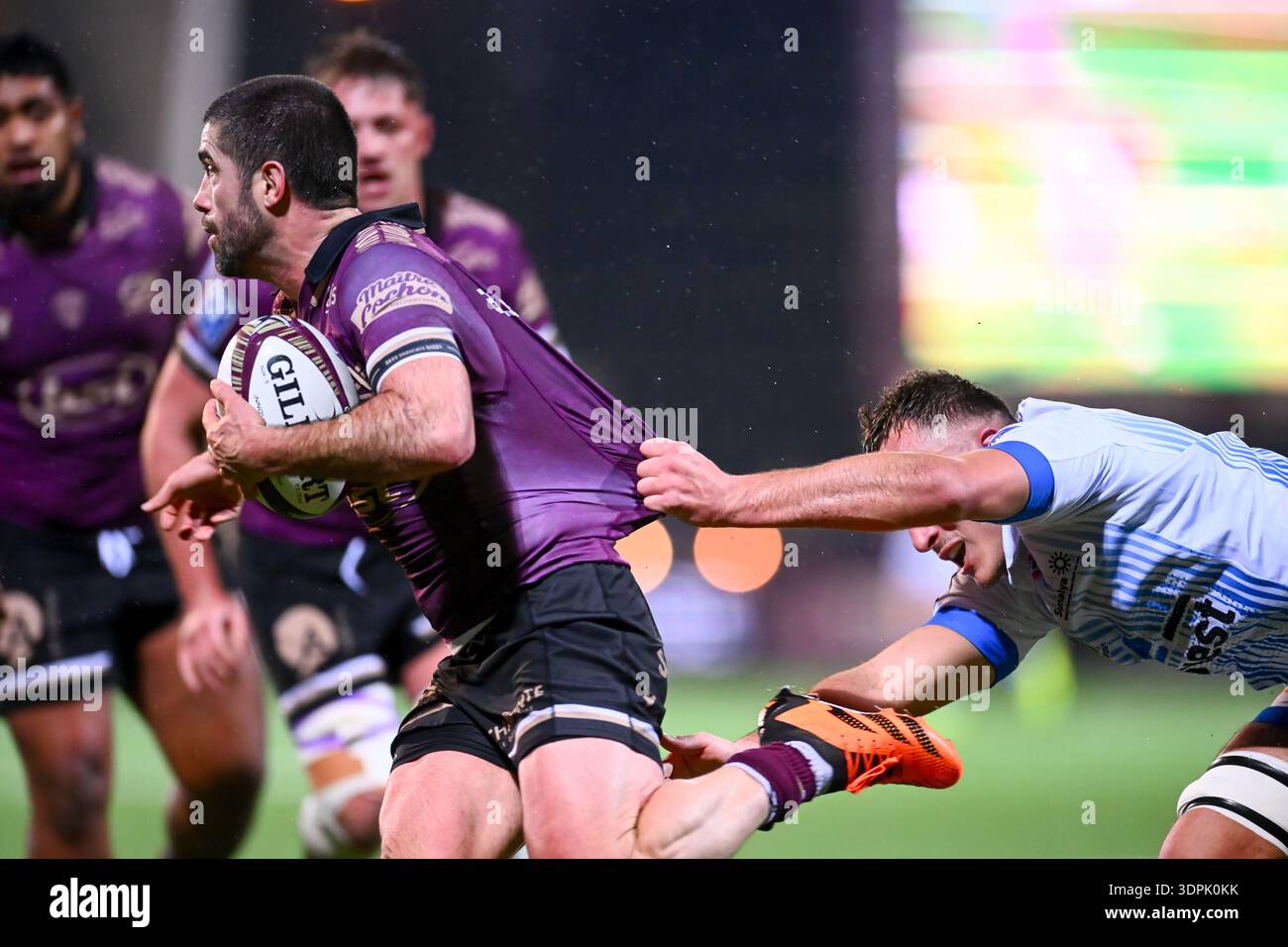 Emmanuel Saubusse of Soyaux Charentes and Aurelien Lafforgue of Stade ...