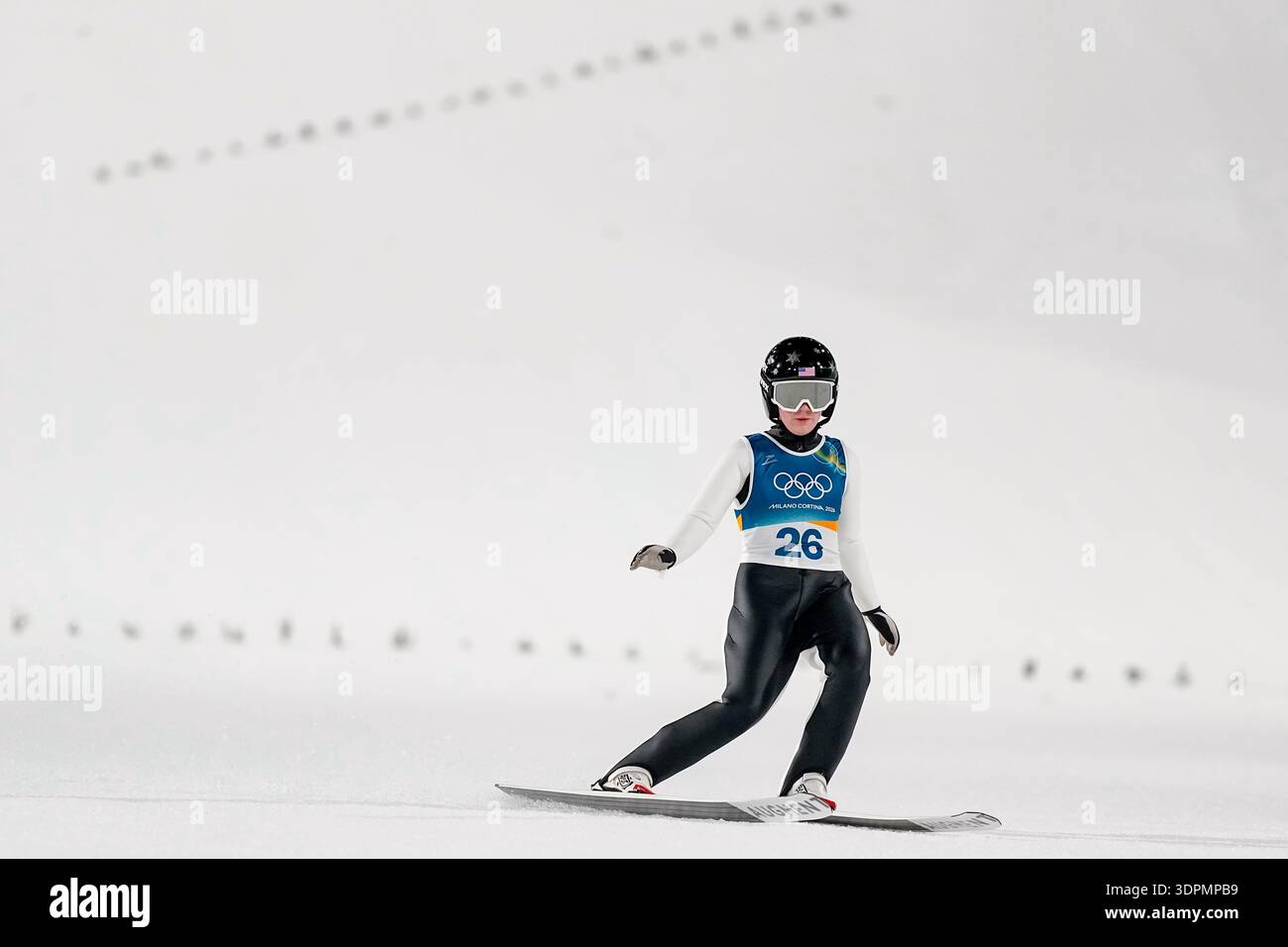 Josie Johnson, of the United States, brakes in the finish area after ...