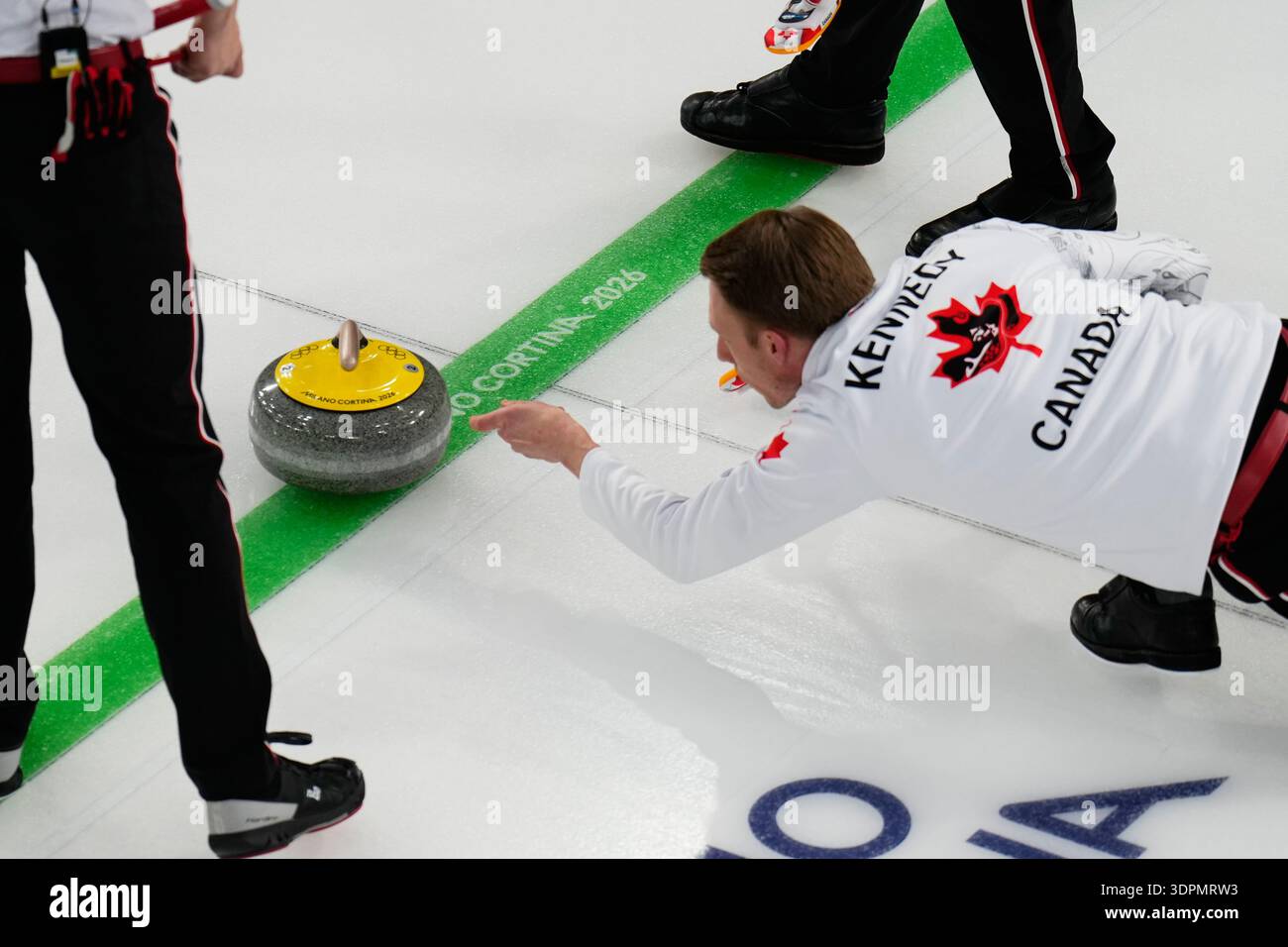 Canada's Marc Kennedy delivers the stone during a men's curling round ...