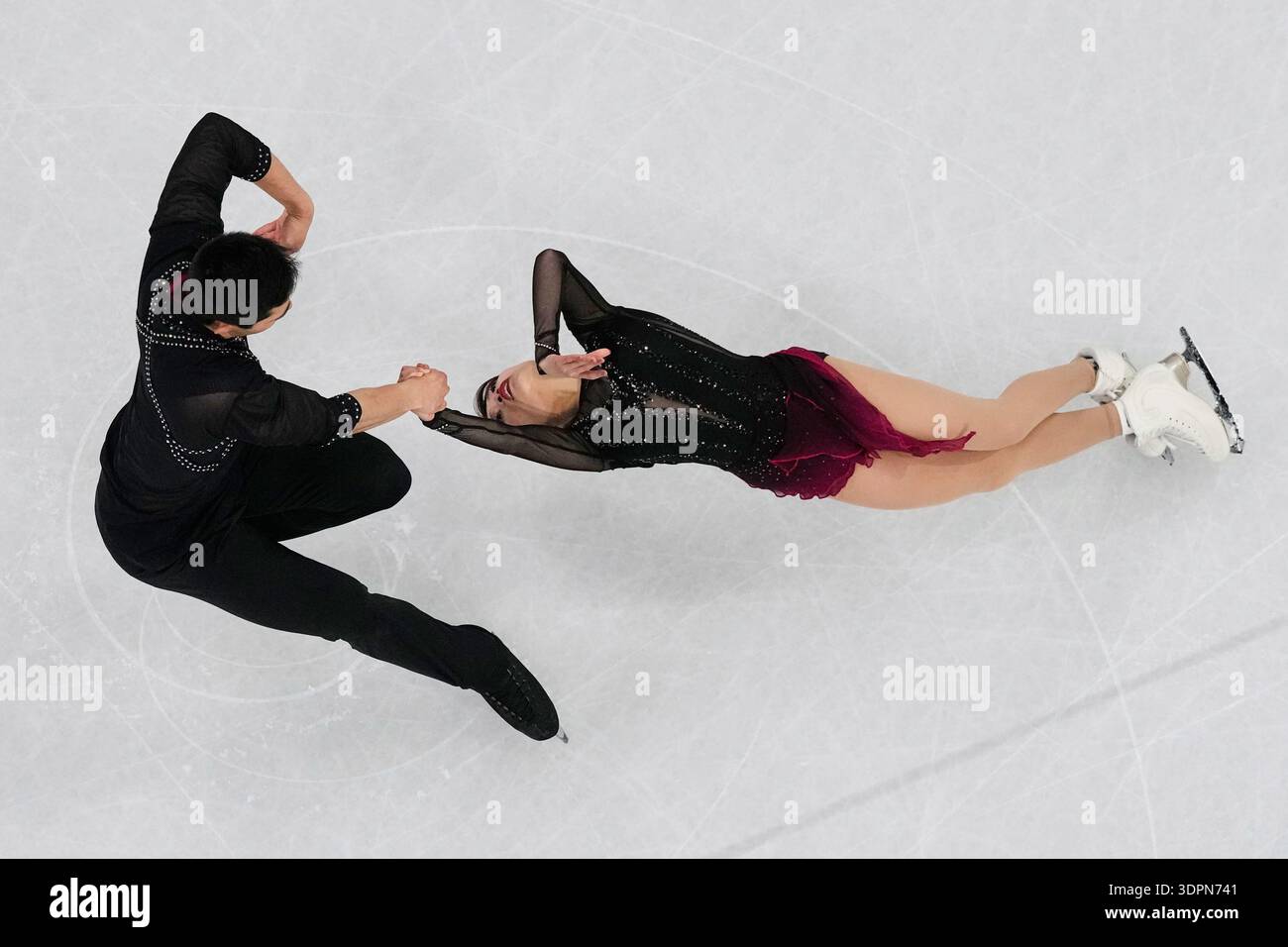 Emily Chan and Spencer Akira Howe of the United States compete during ...