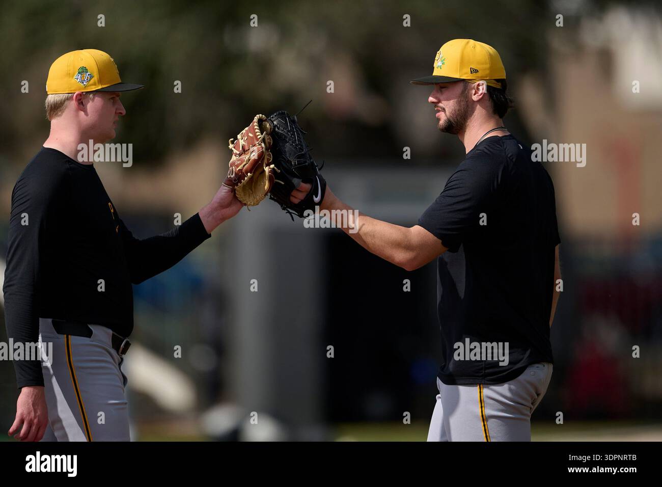 Pittsburgh Pirates pitcher Noah Murdock (left) fist bumps Paul Skenes ...