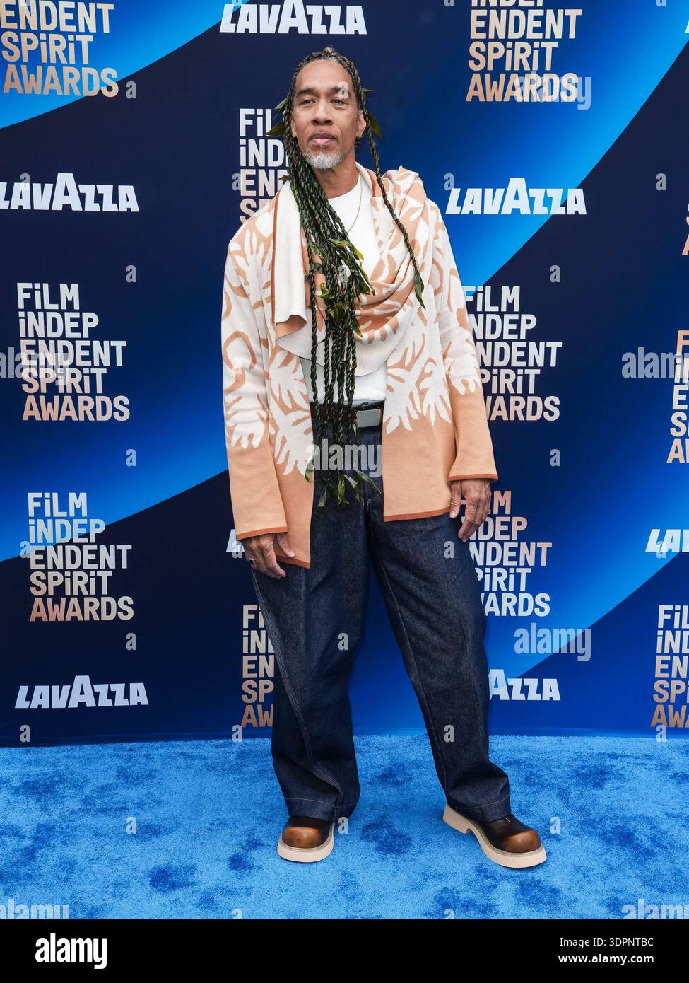 Moses Goods walking on the red carpet at the 2026 Film Independent ...