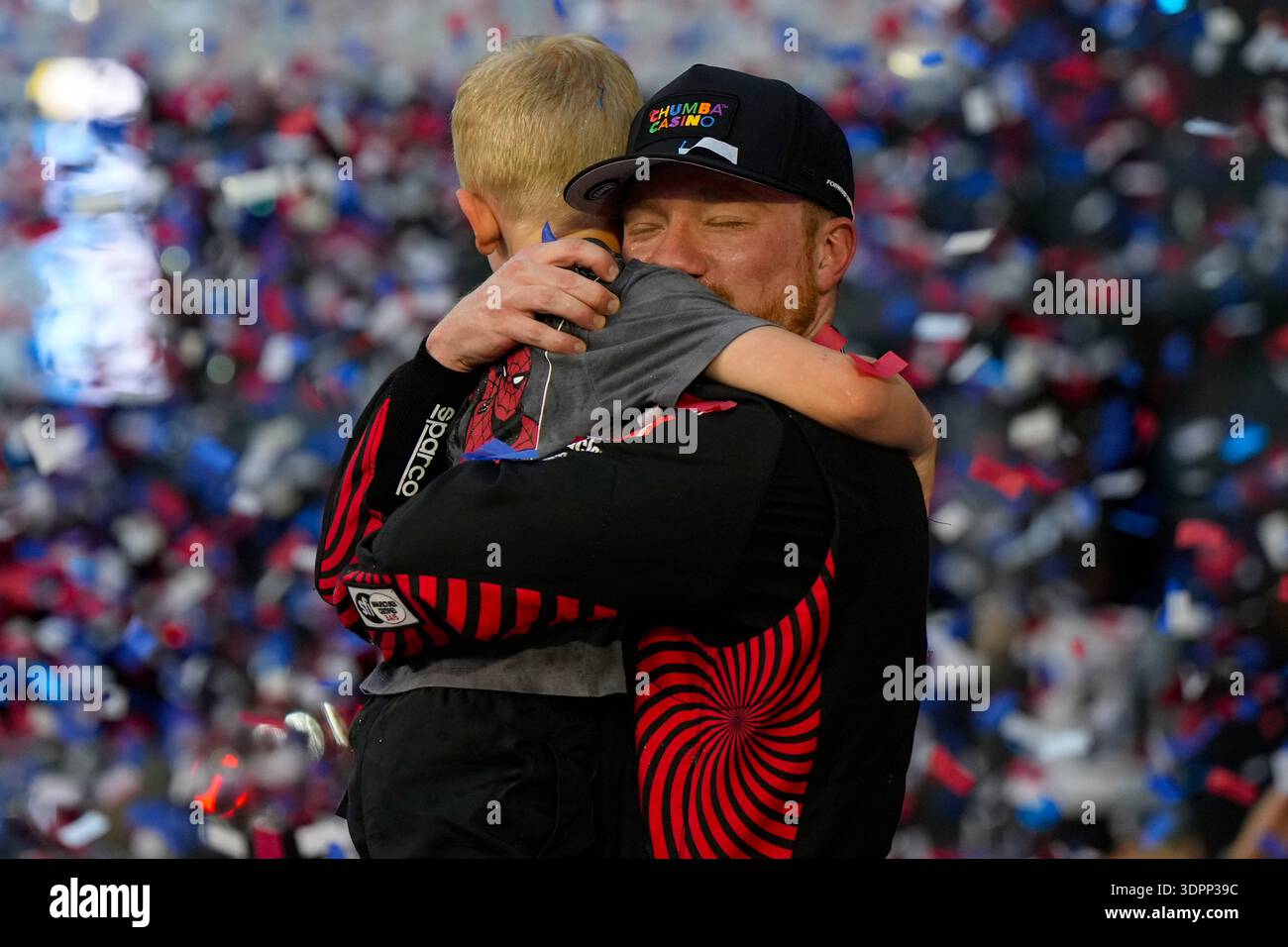 Tyler Reddick, (45) and his son Beau celebrate with the team after ...
