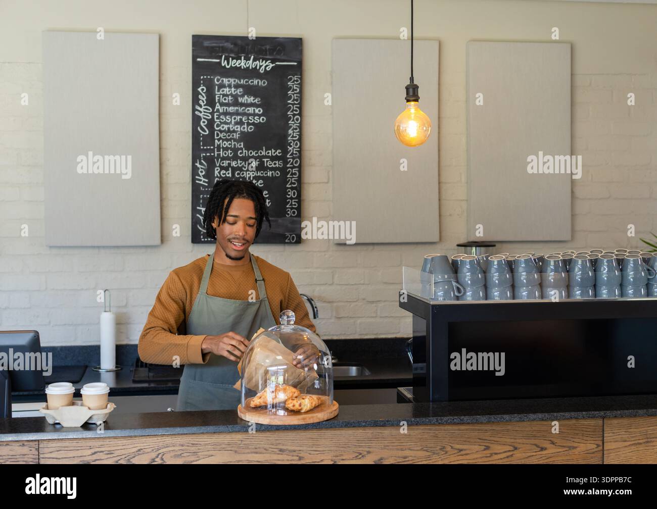 African american barista lifting hi-res stock photography and images ...
