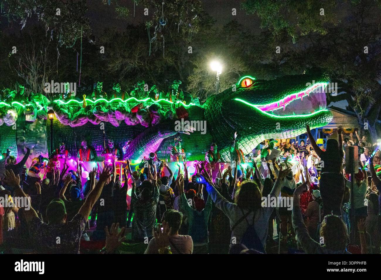 Attendees march during the annual Krewe of Bacchus parade during the ...