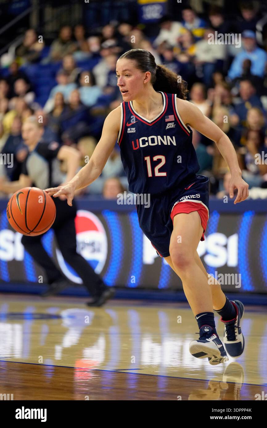 UConn guard Ashlynn Shade dribbles during the second half of an NCAA ...