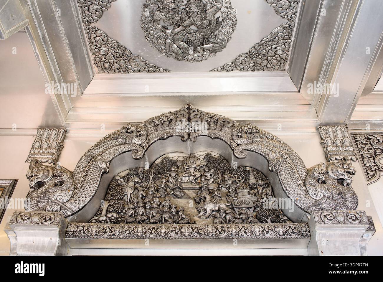 Intricate Thai temple stucco arch with traditional patterns and ...