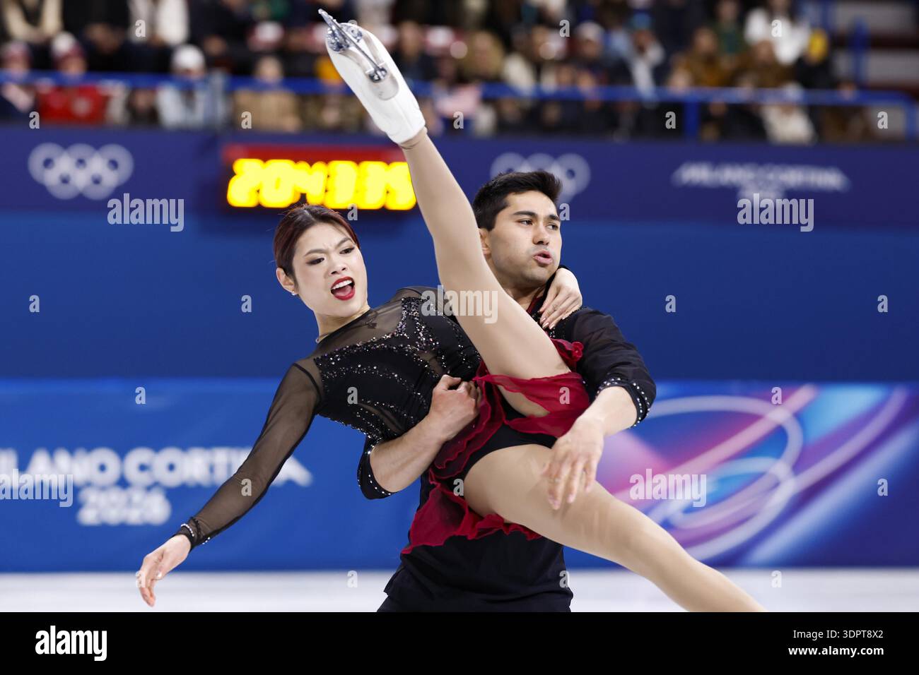 Emily Chan (L) and Spencer Akira Howe of the United States perform in ...