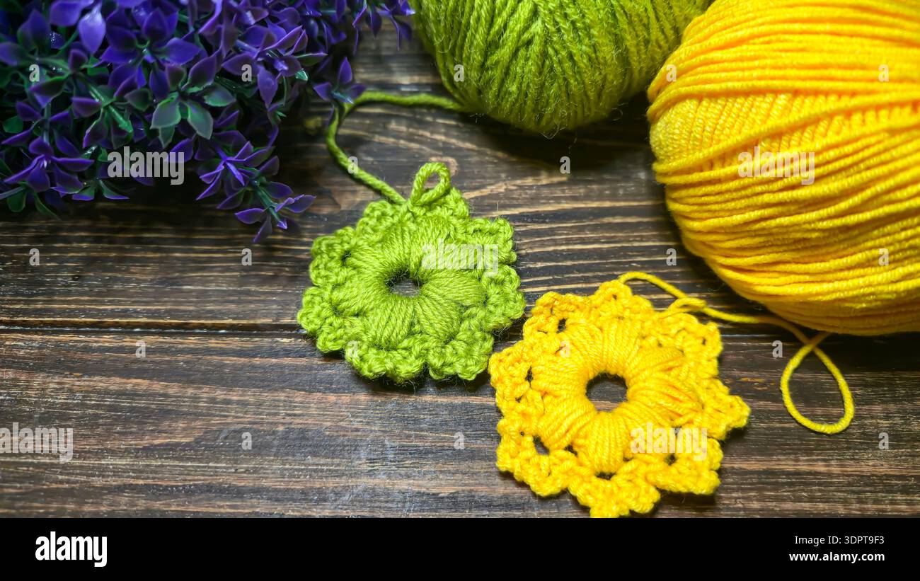 Knitted flowers and circles suitable for home decor, fashion, or ...