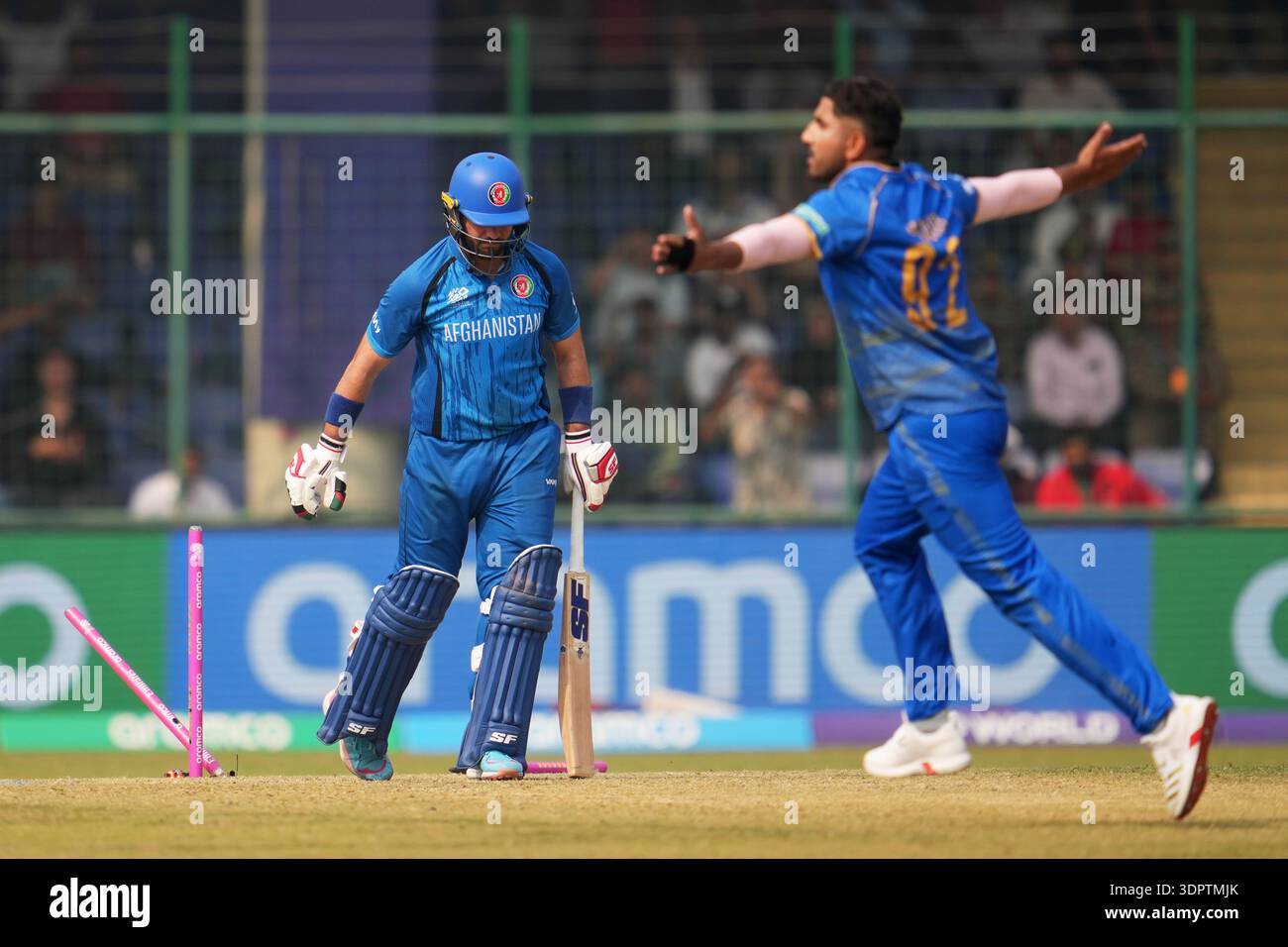 United Arab Emirates' Junaid Siddique, right, celebrates the wicket of ...
