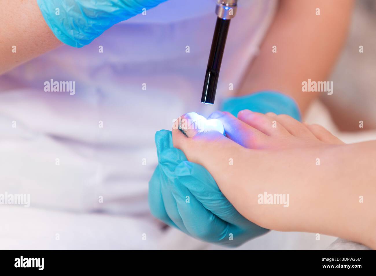 Professional pedicure podologist give hi-res stock photography and ...