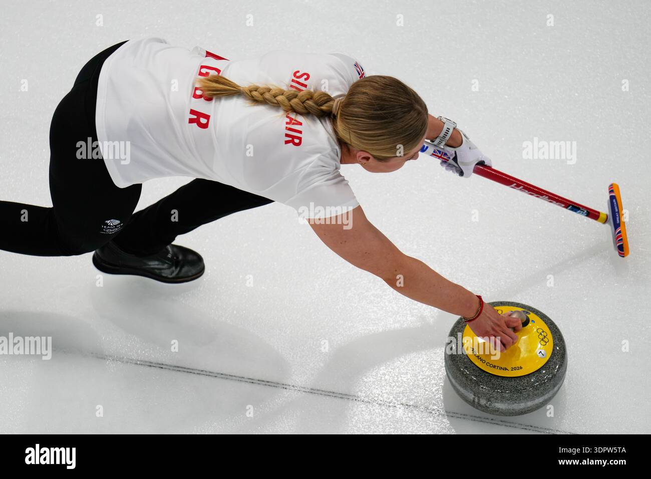 Great Britain's Sophie Sinclair delivers the stone during a women's ...