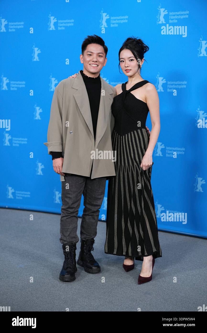 Koh Jia Ler, left, and Regene Lim pose for photographers at the photo ...